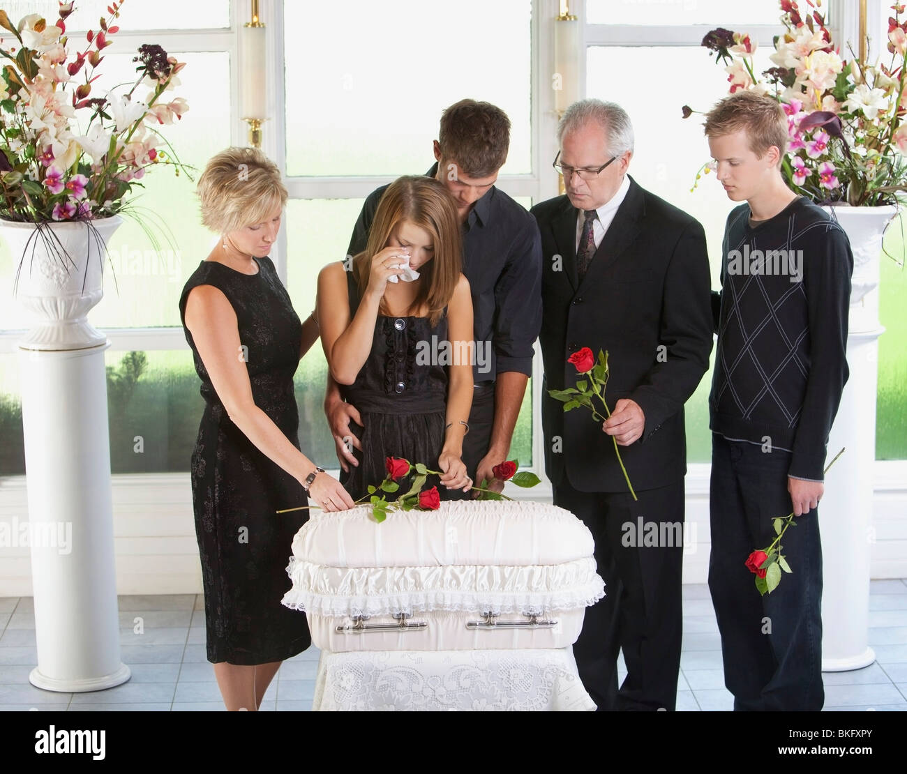 Grieving Family With An Infant's Coffin Stock Photo - Alamy