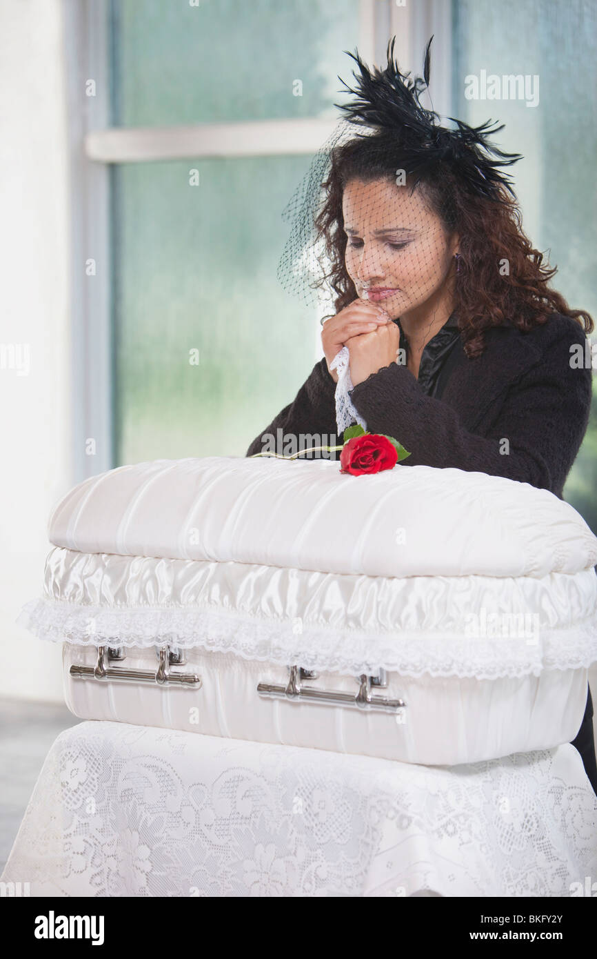 Mother Grieving At An Infant's Coffin Stock Photo - Alamy