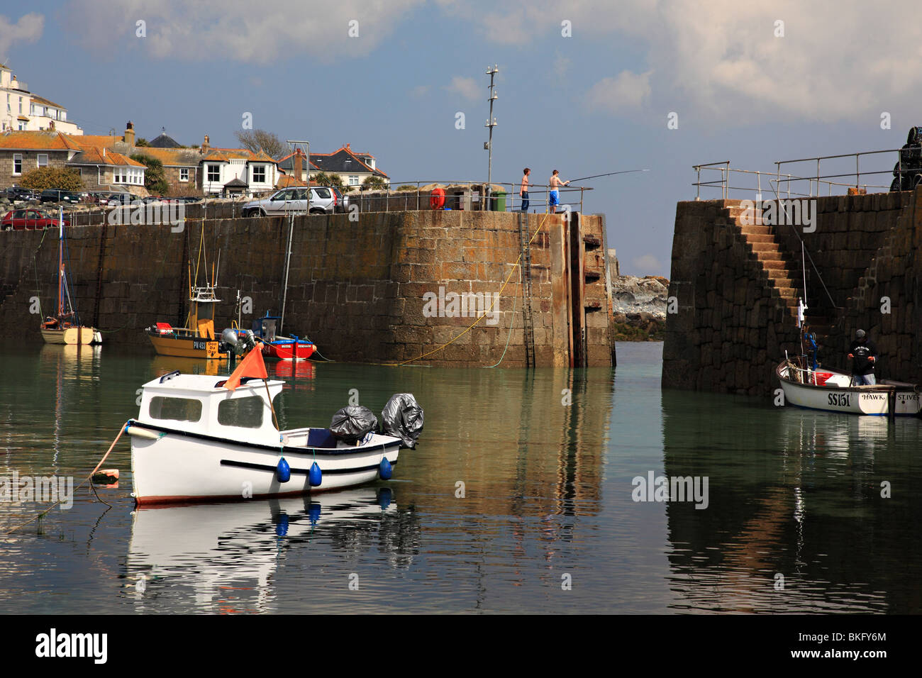 Boats in Mousehole harbour Cornwall England Stock Photo - Alamy