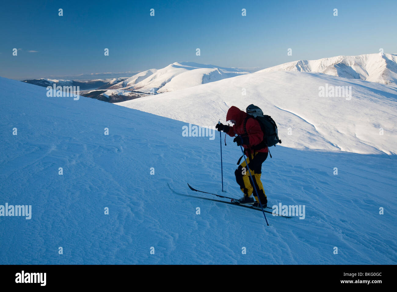 Mike Withers using cross country skis to decend the Peak of Great Dodd ...
