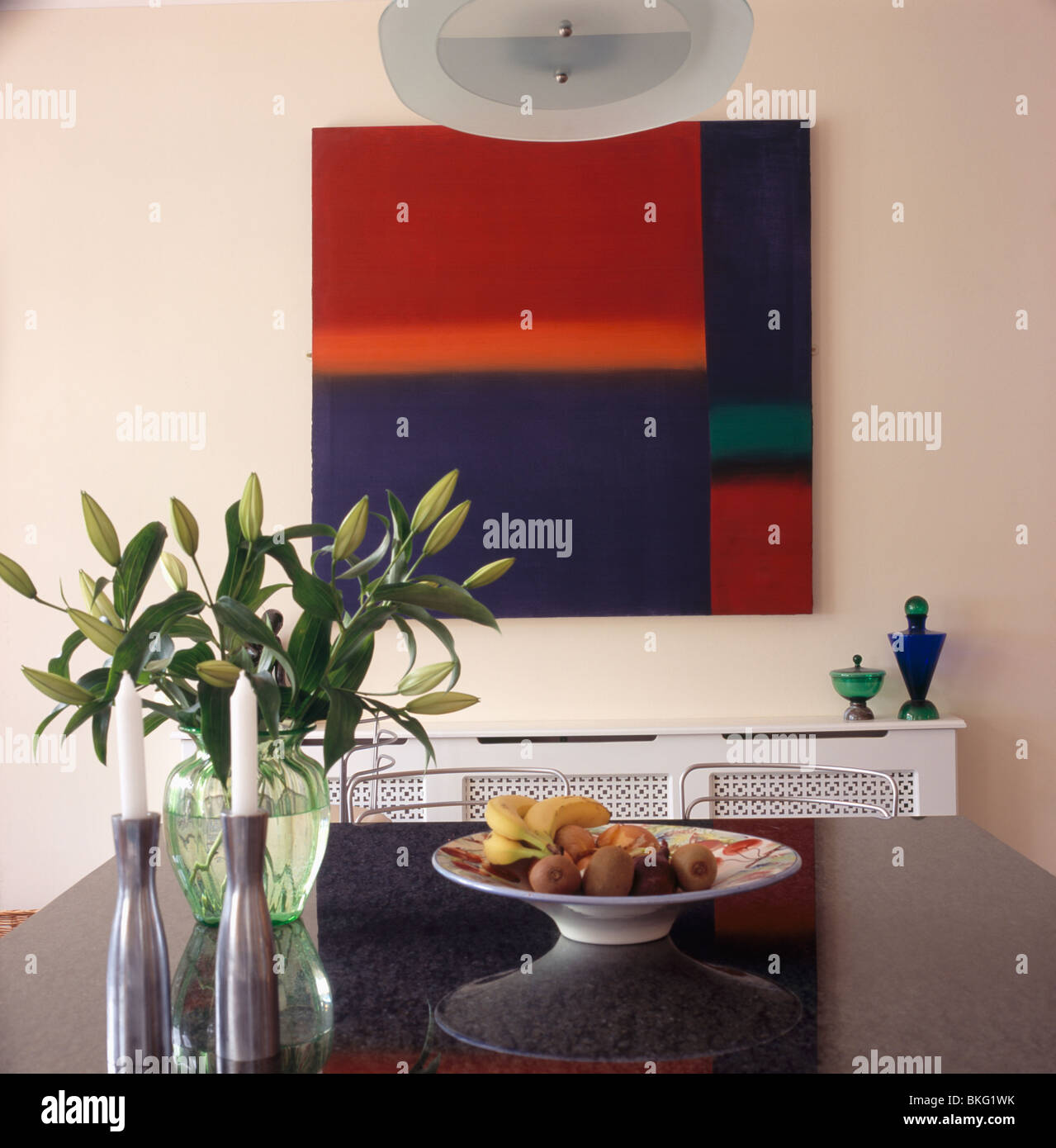 Abstract picture on wall in modern dining room with black table Stock ...