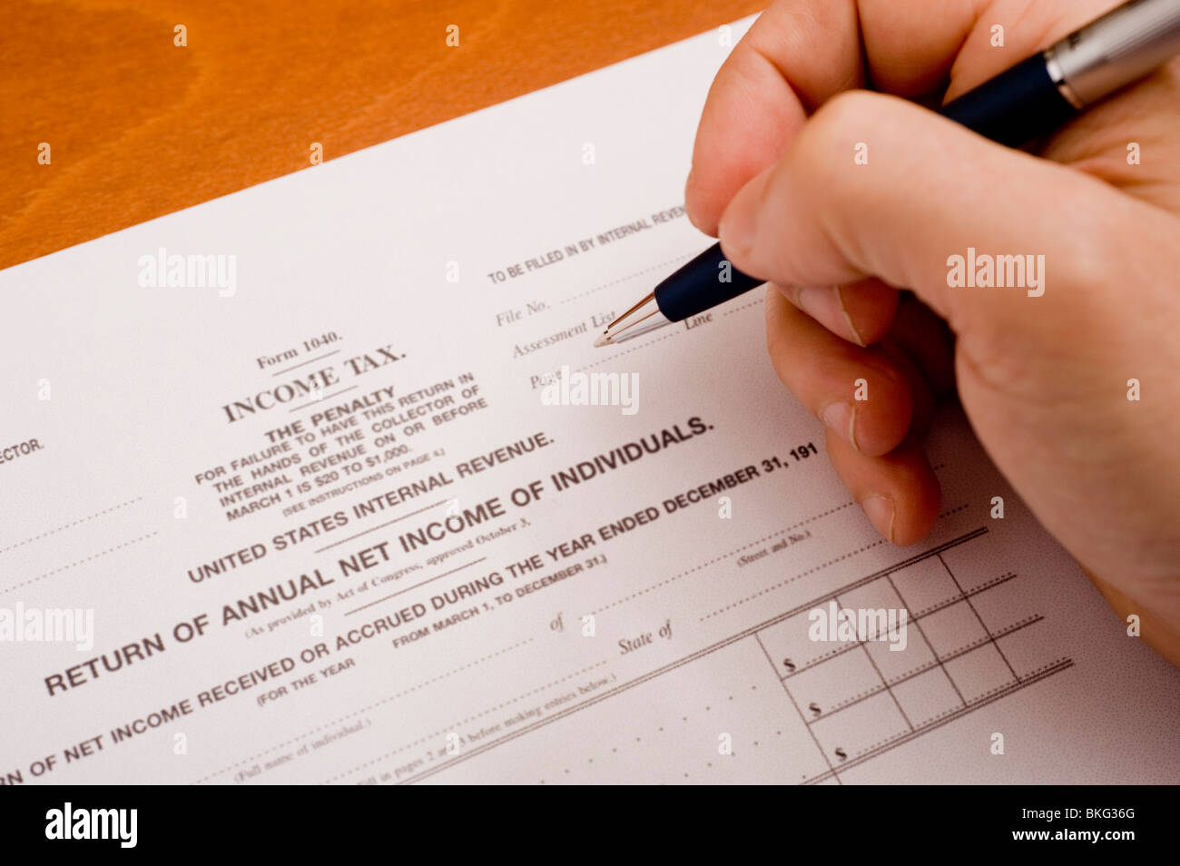 filling a tax form for american IRS Stock Photo - Alamy