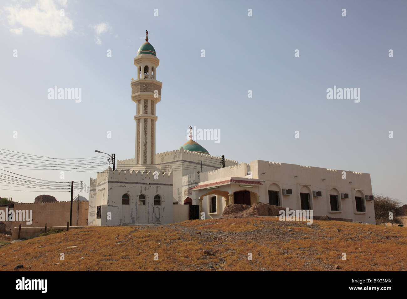 Minaret and mosque at the village of Fanja, Sultanate of Oman. Photo by ...