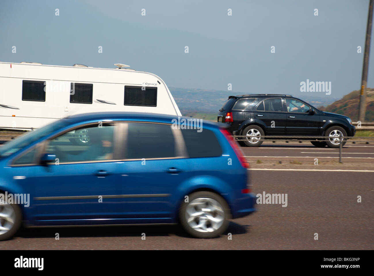 Car & caravan on the M62 (near Huddersfield Stock Photo - Alamy