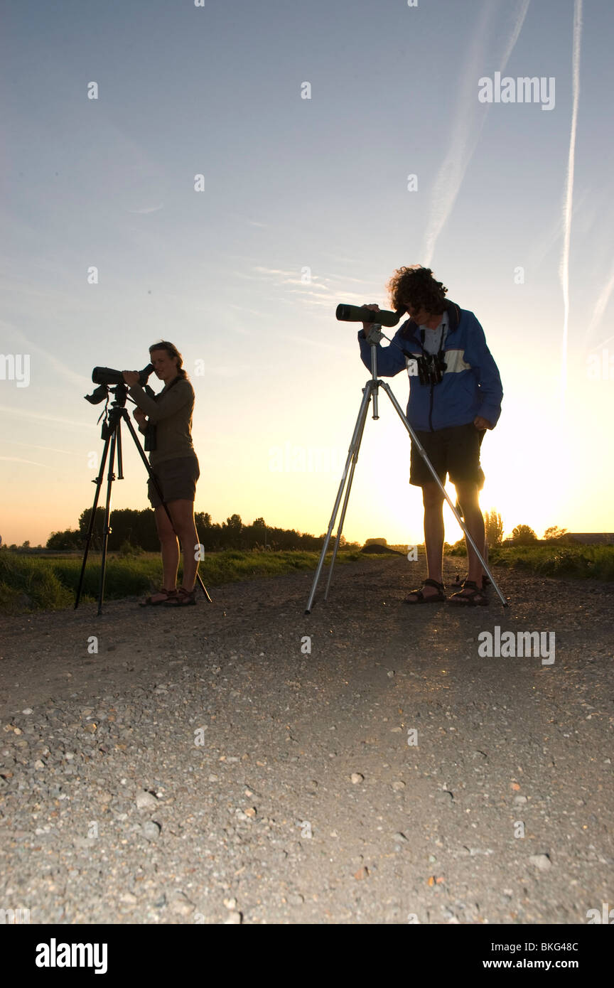 Bird watchers with their telescopes Stock Photo - Alamy