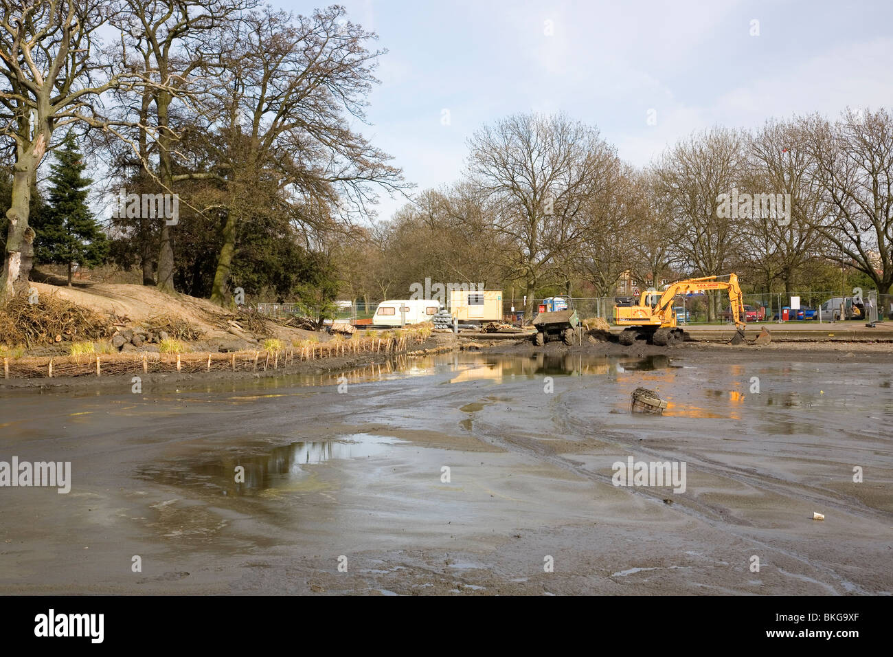 Dredging one of the lakes at Clapham Common Park , London Stock Photo ...