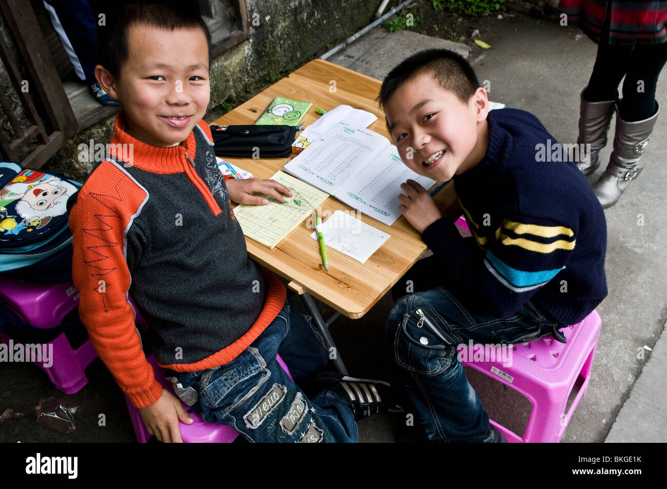 Children doing their homework Stock Photo - Alamy