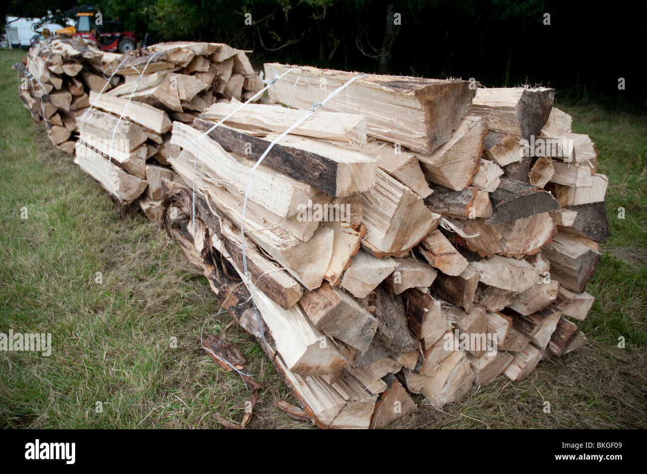 Stack of logs ready for sale Stock Photo - Alamy