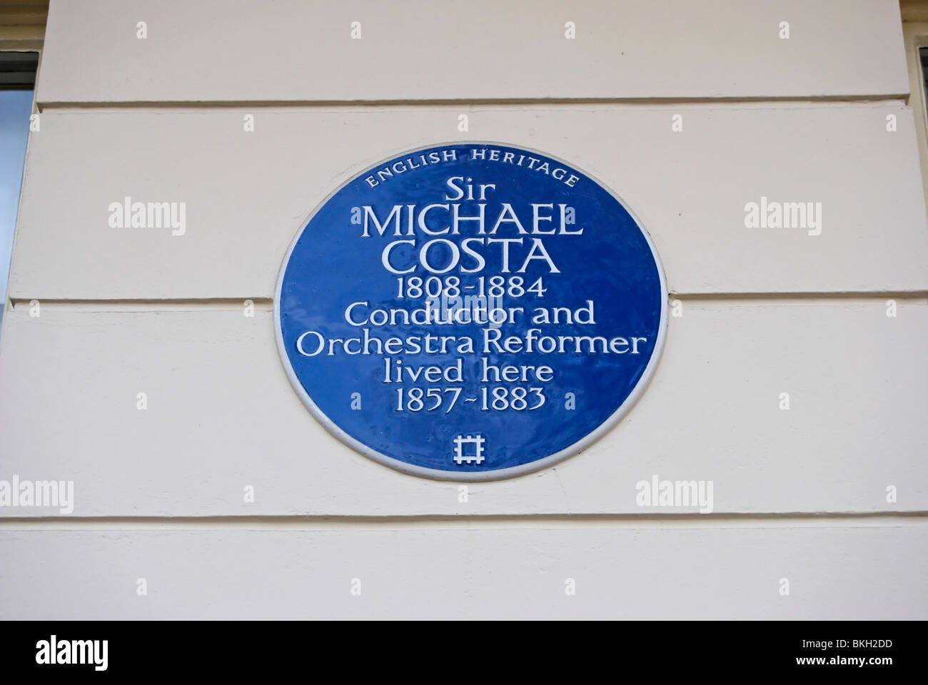 english heritage blue plaque marking a home of sir michael costa ...