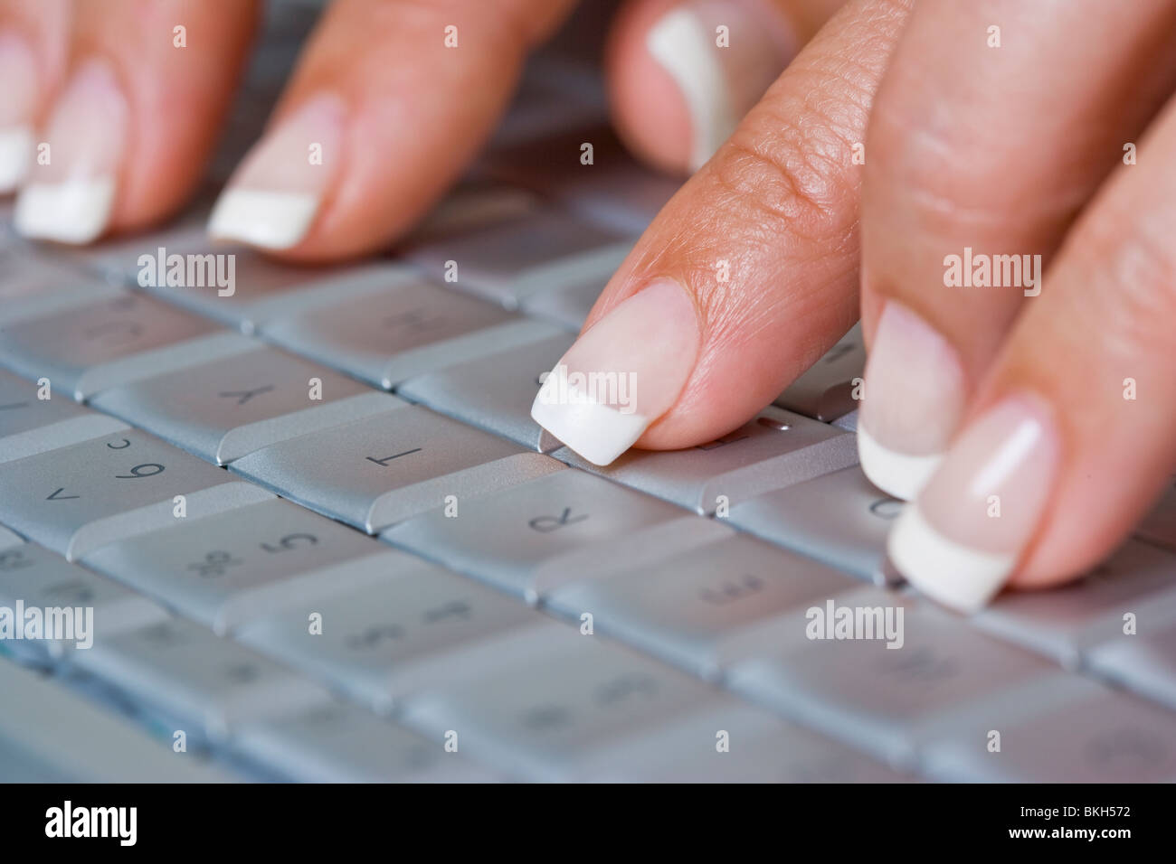 Woman typing on keyboard extreme hi-res stock photography and images ...