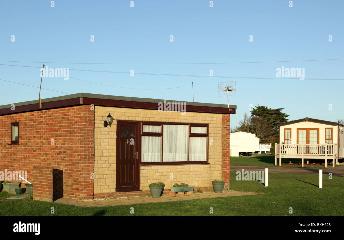 Single brick chalet building on a caravan park - UK Stock Photo - Alamy