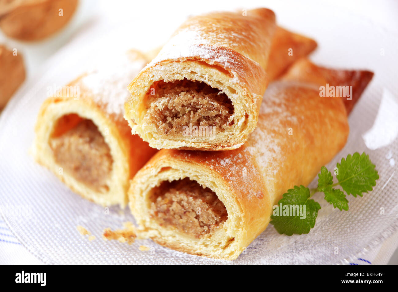Sweet pastry rolls with nut filling Stock Photo - Alamy