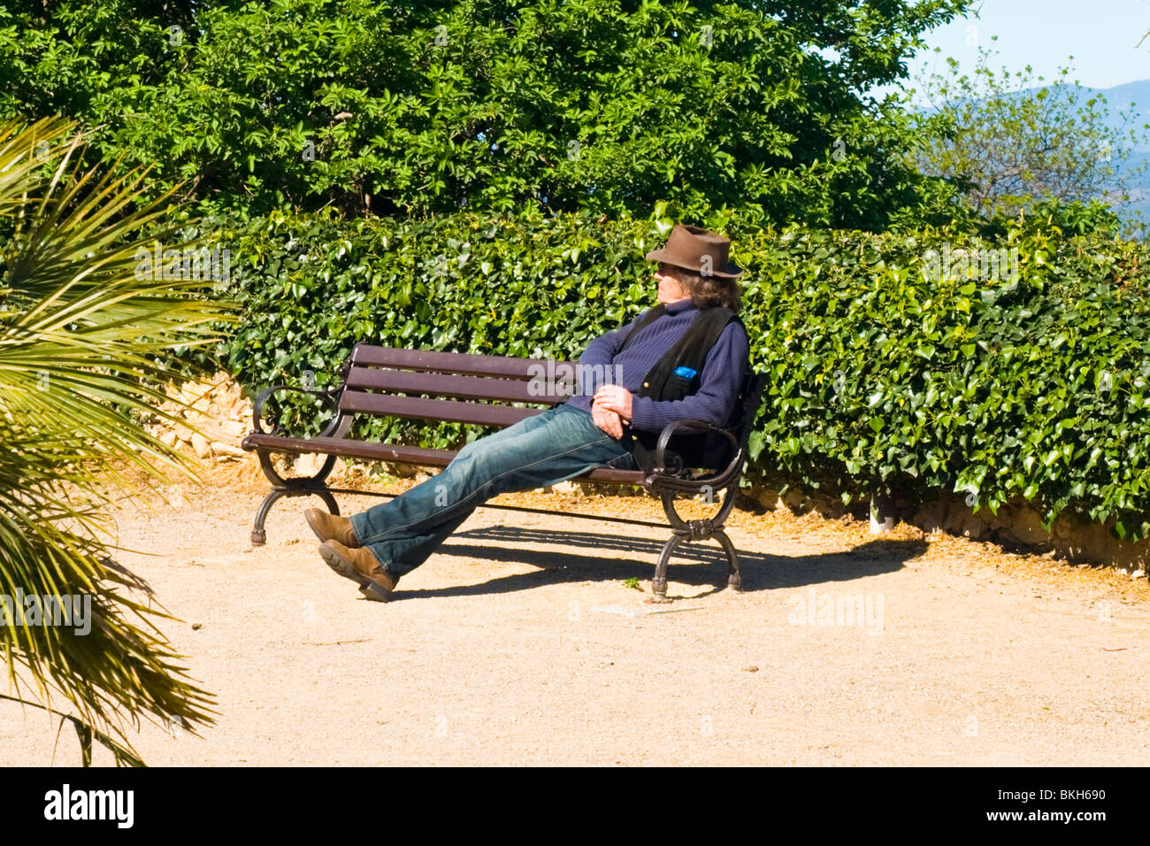 Person lounging in the sun hi-res stock photography and images - Alamy