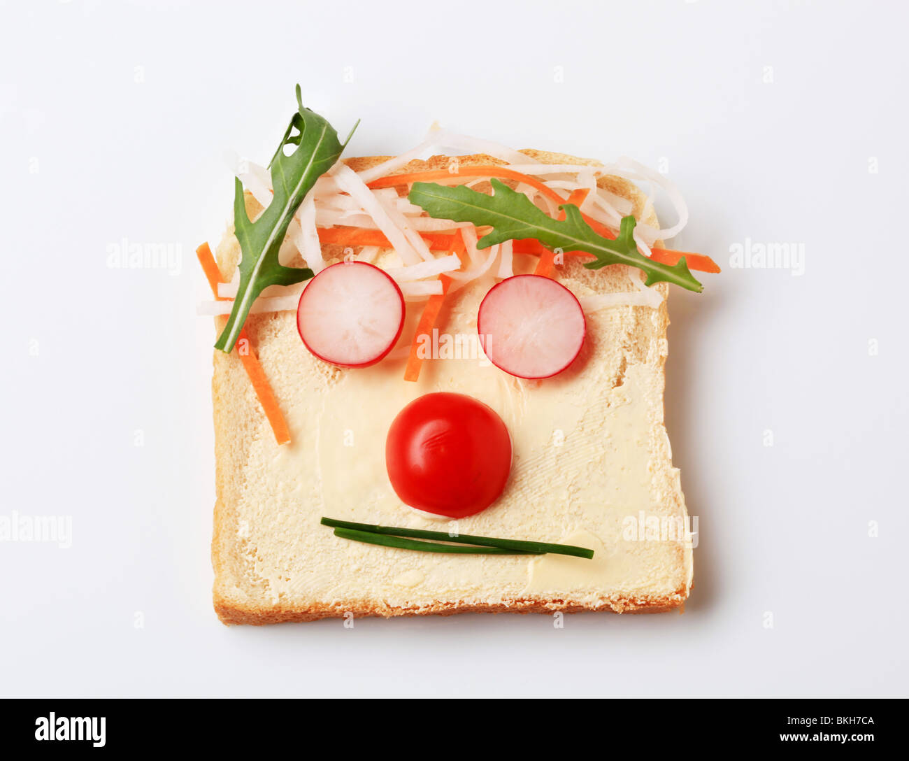 Face on bread, made from fresh vegetables Stock Photo - Alamy