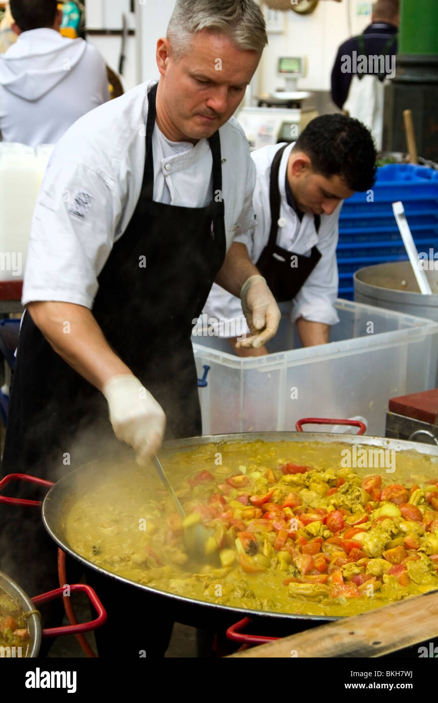 Person cooking curry hi-res stock photography and images - Alamy