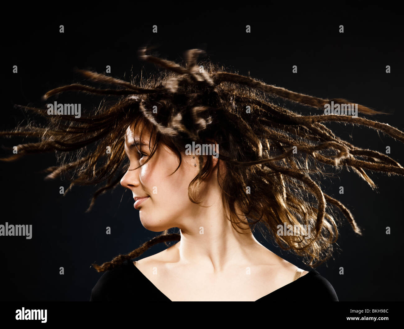 studio shot portraits of a young blond caucasian woman with dreadlocks ...
