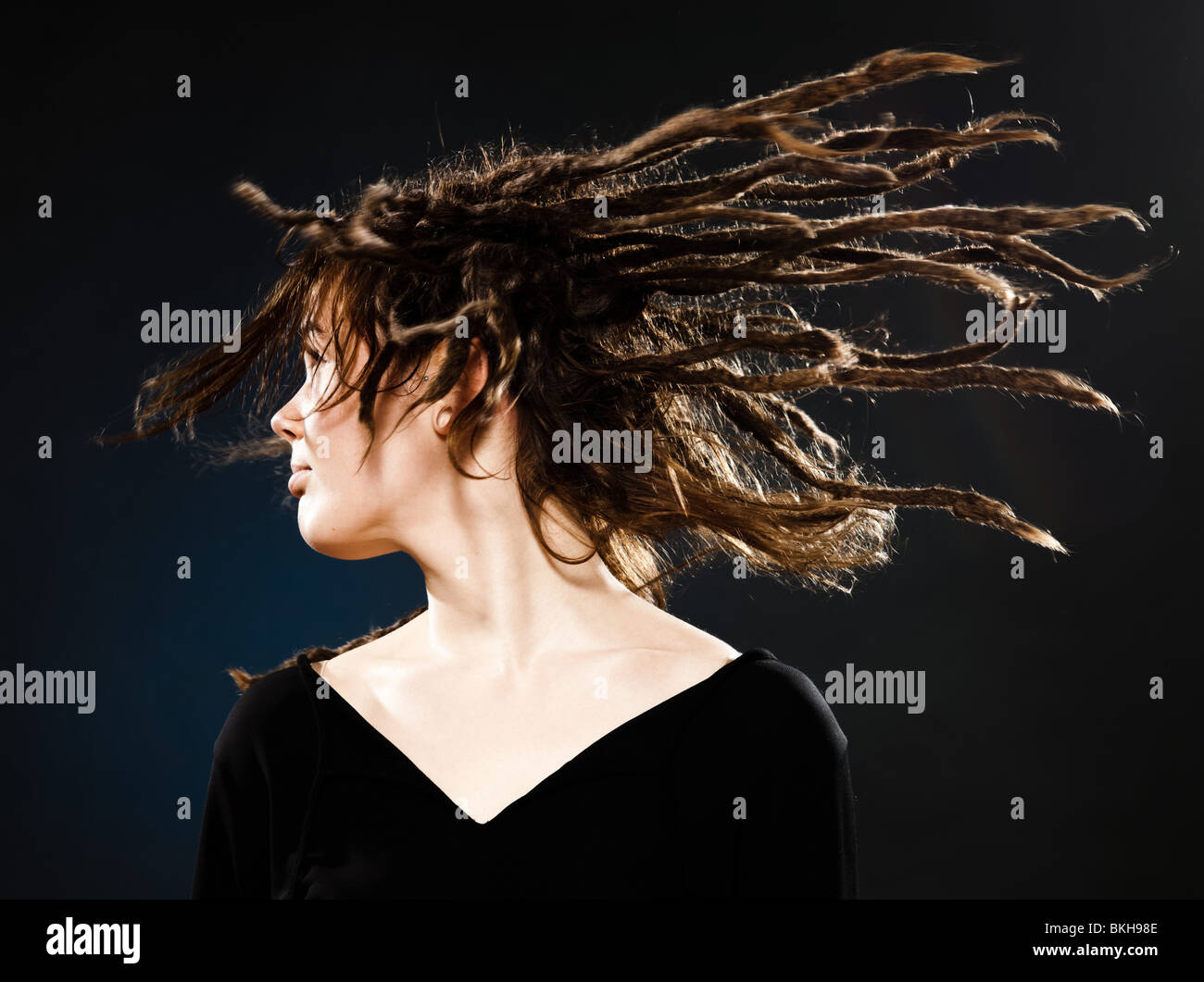 studio shot portraits of a young blond caucasian woman with dreadlocks ...