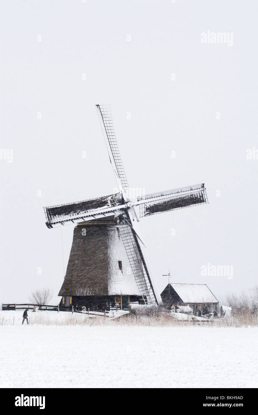 Windmill with snow Stock Photo - Alamy