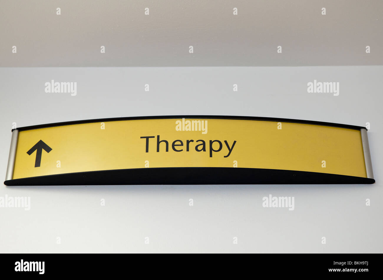 Yellow sign with the word 'Therapy' Stock Photo - Alamy