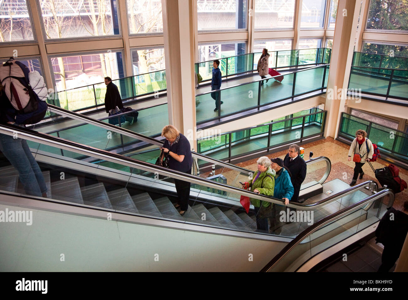 People on ramp and escalator at Gatwick airport England UK Stock Photo ...