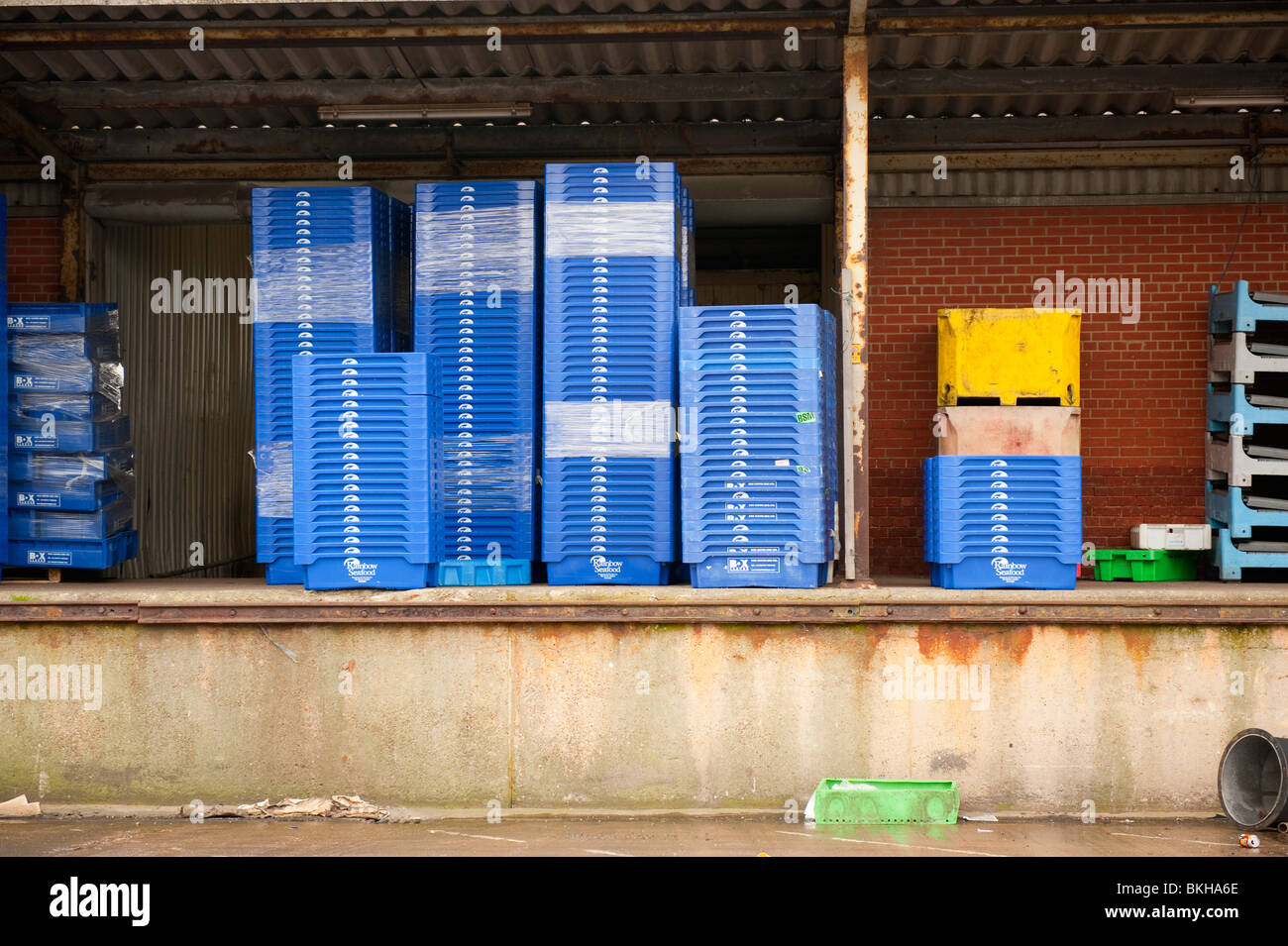 Fish trays at Grimsby fish market UK Stock Photo - Alamy