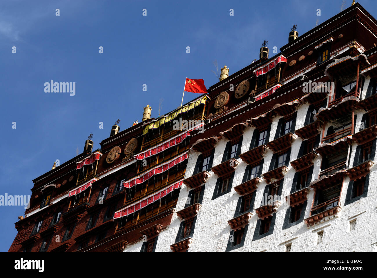 View of Potala Palace,Lhasa,Tibet,China, with Chinese flag Stock Photo ...