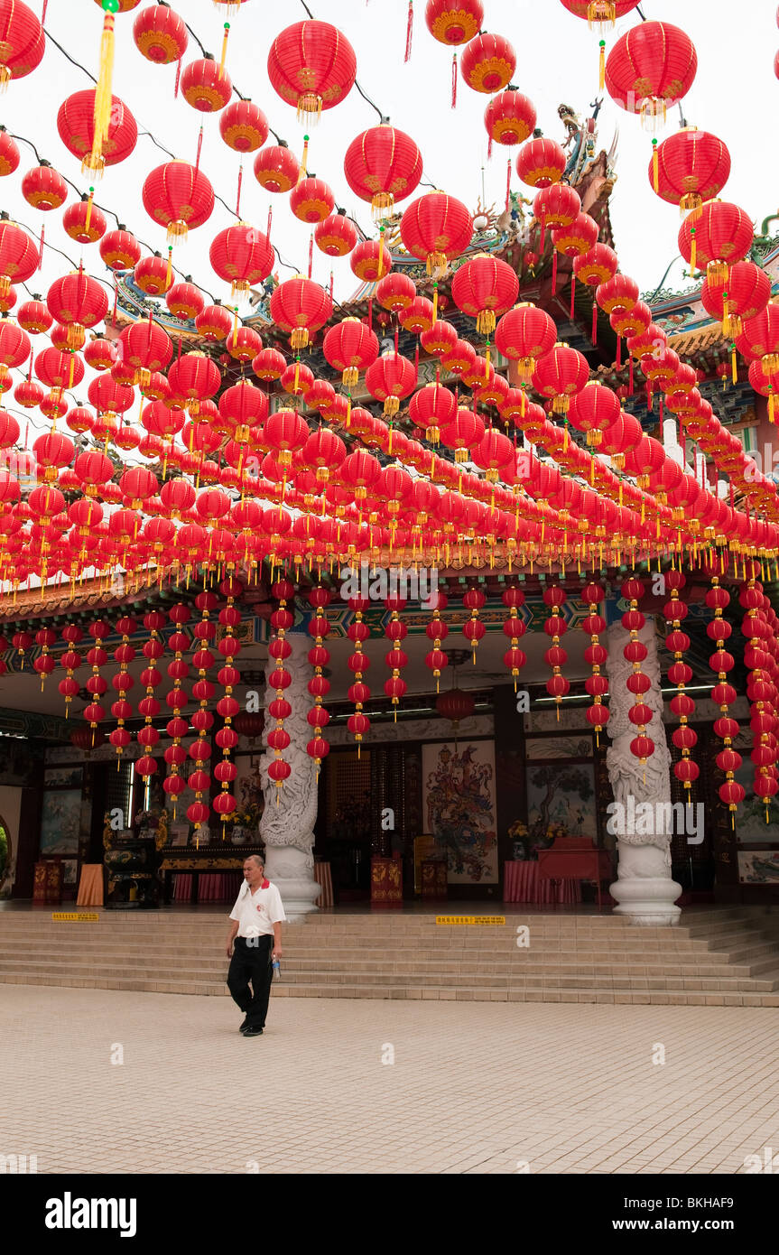 Man walking under Chinese lanterns at Thean Hou Temple in Kuala Lumpur ...