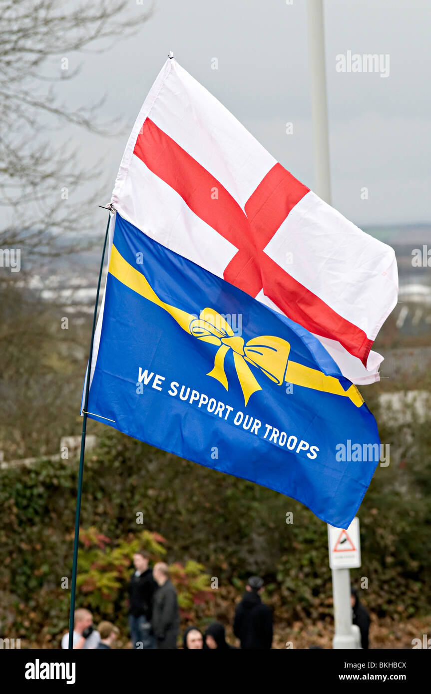 st georges flag being held above a we support our troops flag in dudley ...