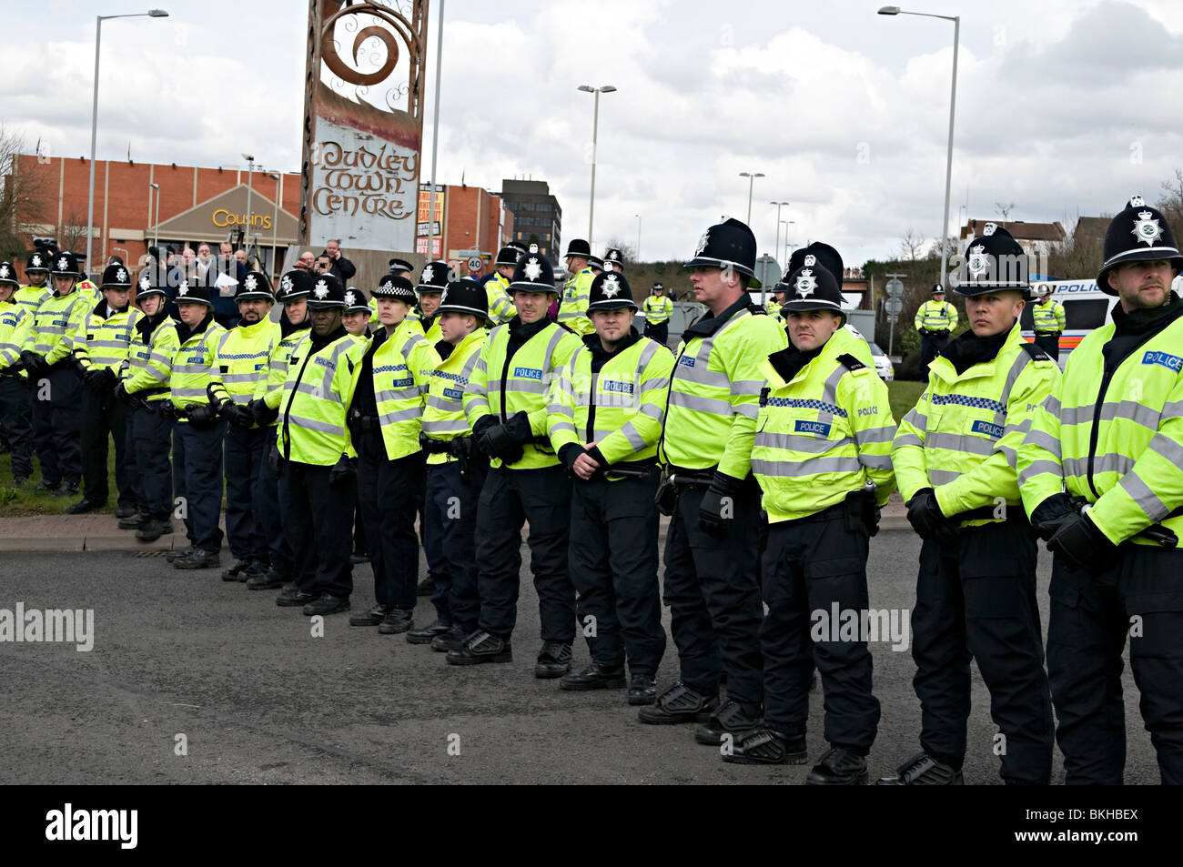 riot police at the edl demo in dudley uk against the building of a ...