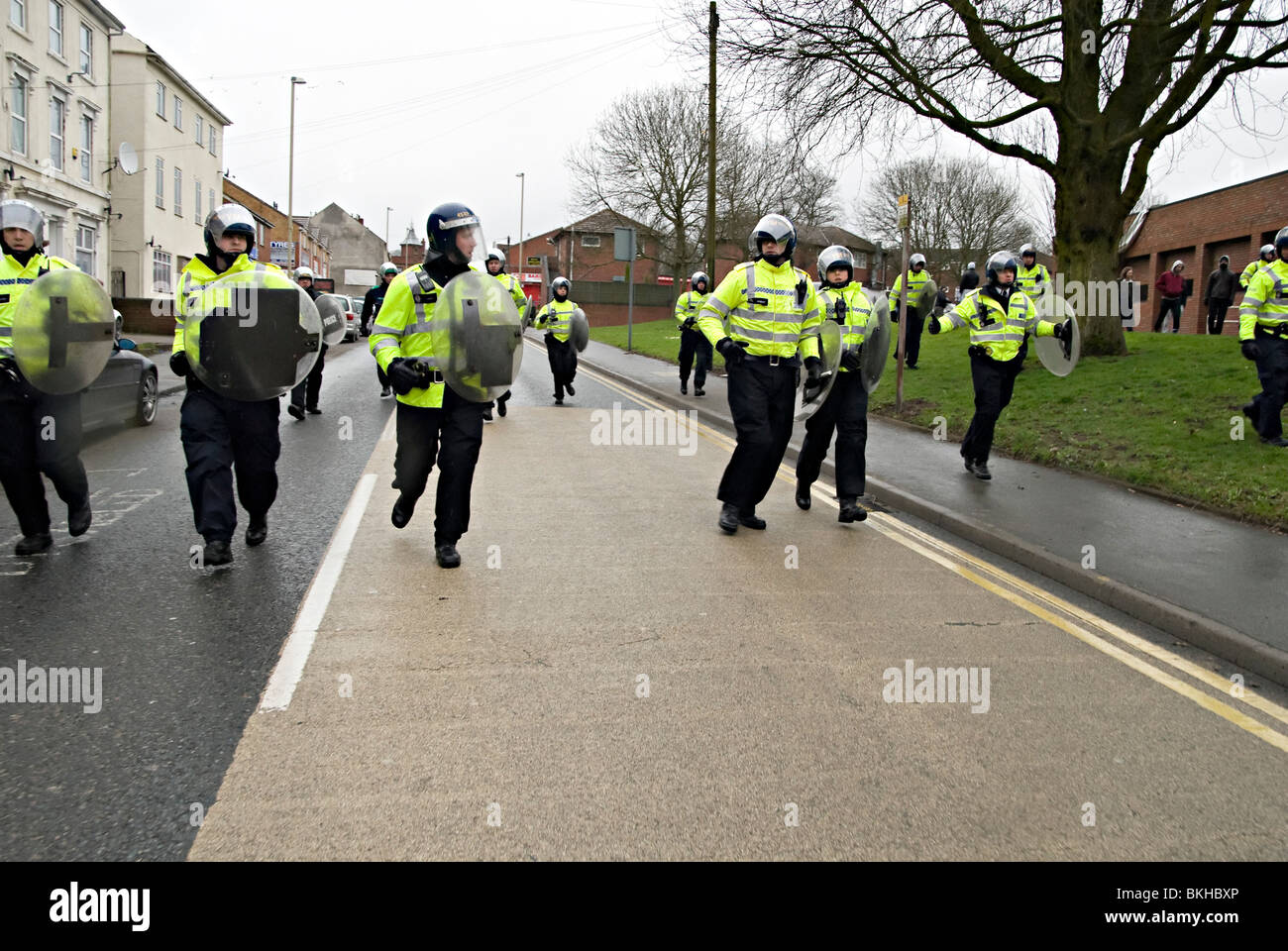 riot police at the edl demo in dudley uk against the building of a ...