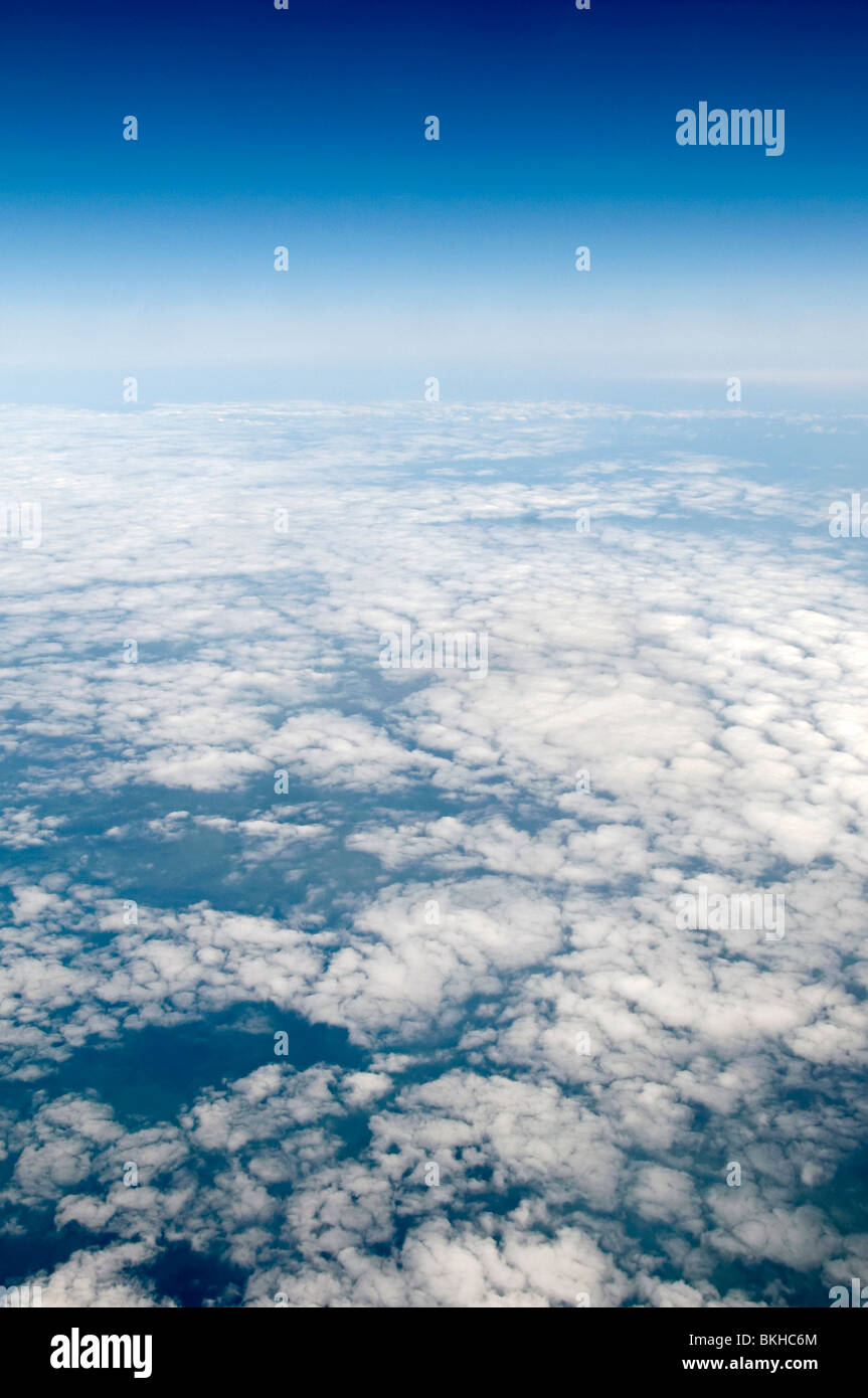 the sky and earth from above taken from an airplane window Stock Photo ...