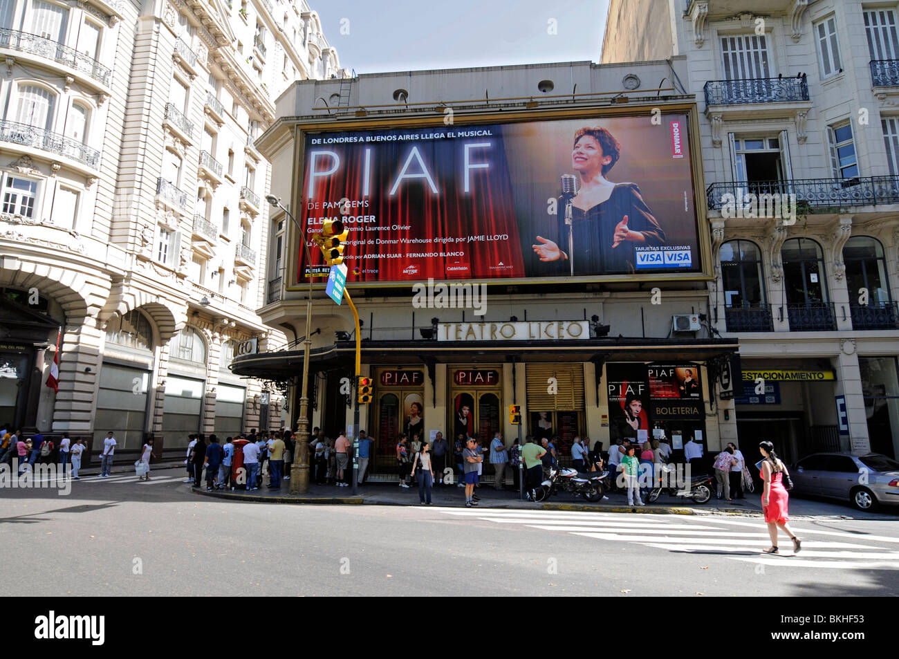 People queeing in front of a theatre to see a play called 'Edith Piaf ...