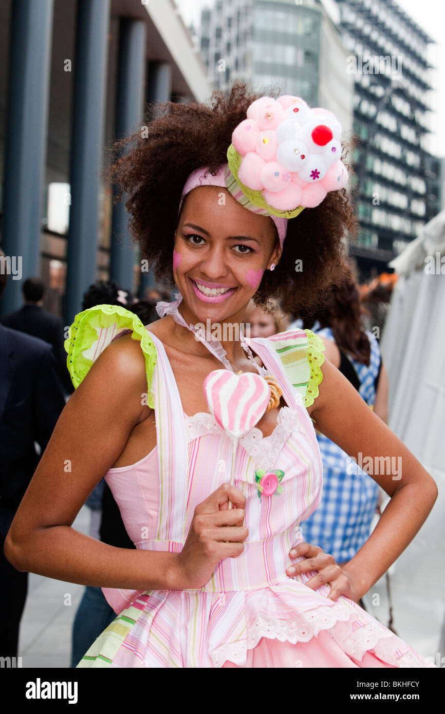 Black model posing with a big hat and lollipop, Alternative Fashion ...