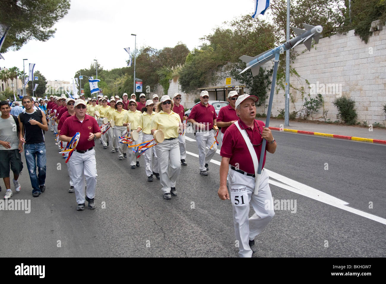 Israel, Jerusalem, People marching in the Jerusalem annual parade ...
