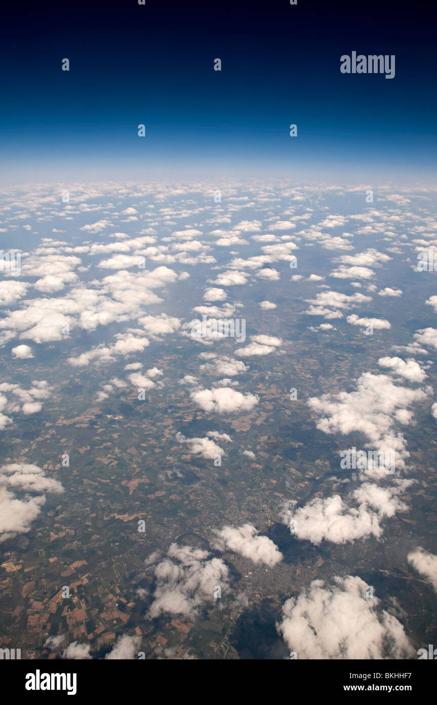 the sky and earth from above taken from an airplane window Stock Photo ...