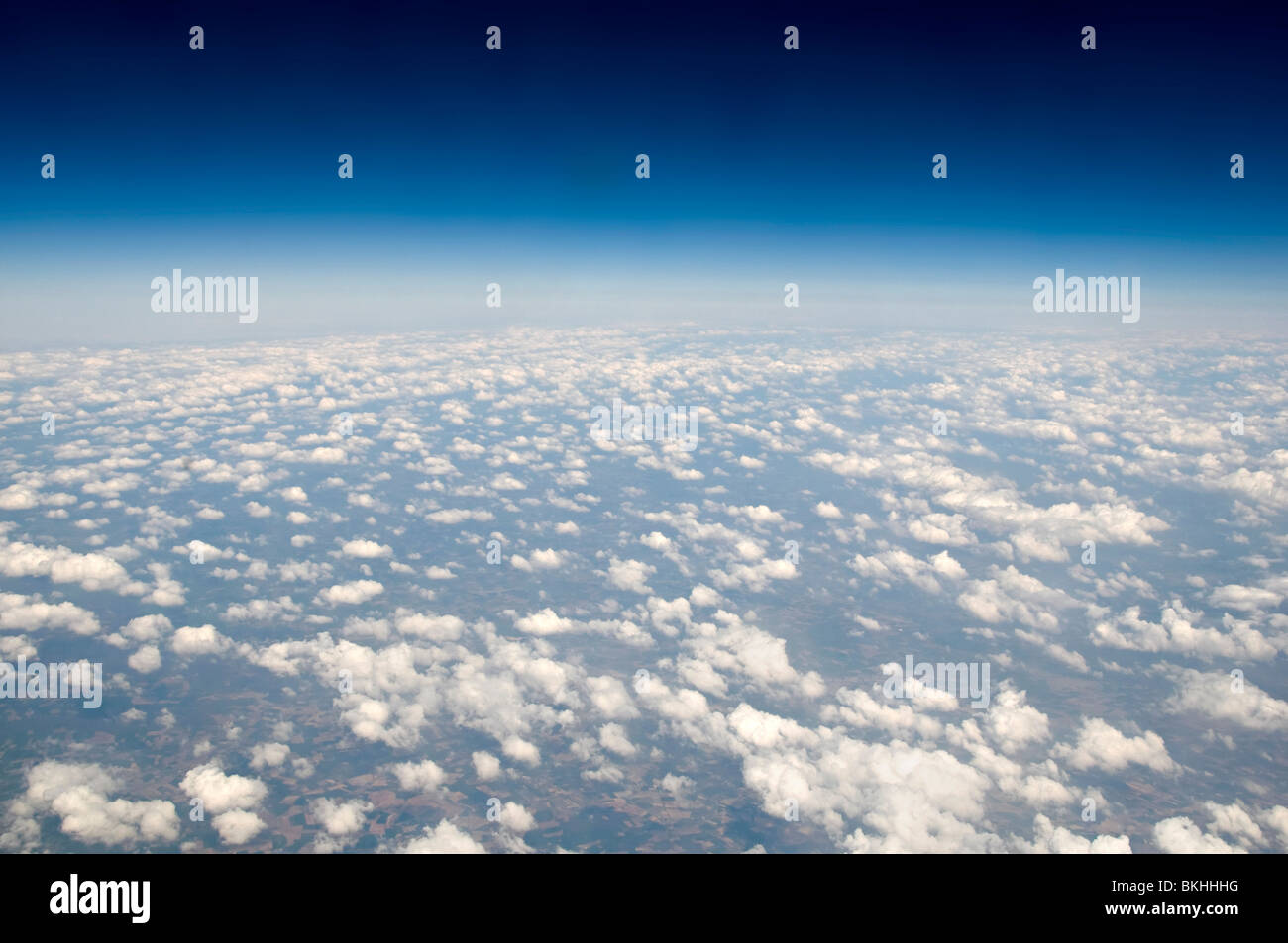 the sky and earth from above taken from an airplane window Stock Photo ...