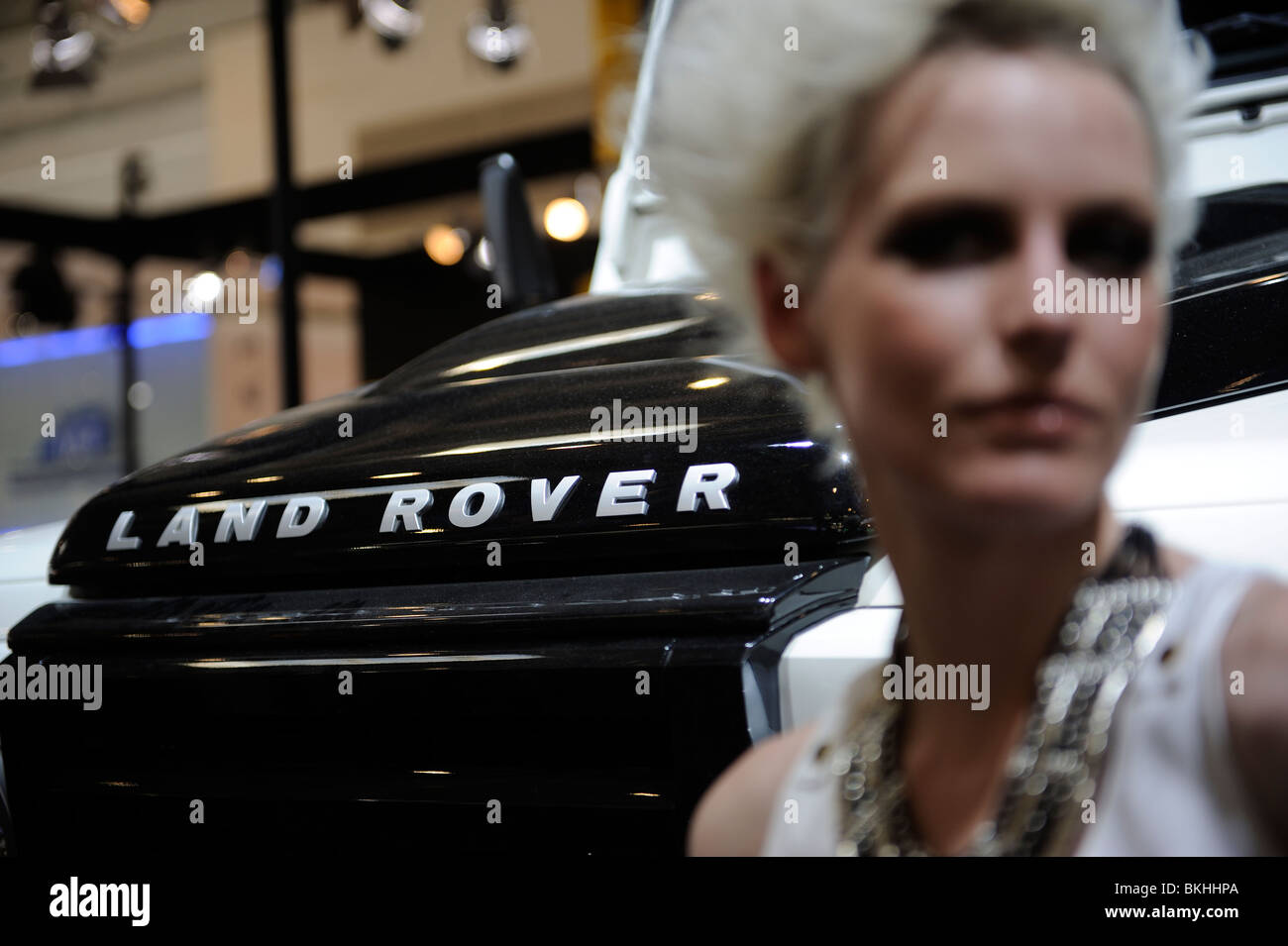 A model poses beside a Land Rover at the Beijing Auto Show. 24-Apr-2010 ...