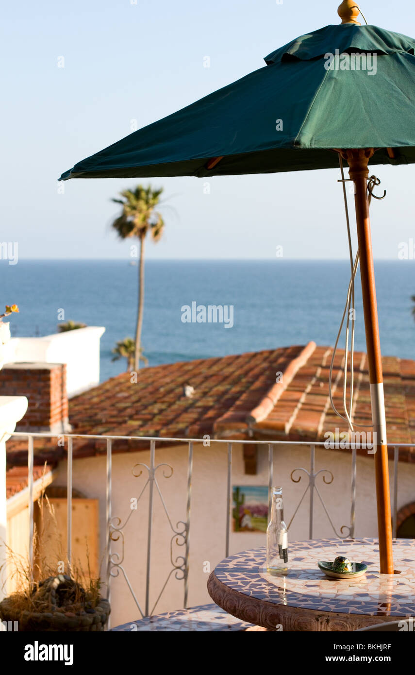 Ocean view patio seating at sunset Stock Photo - Alamy