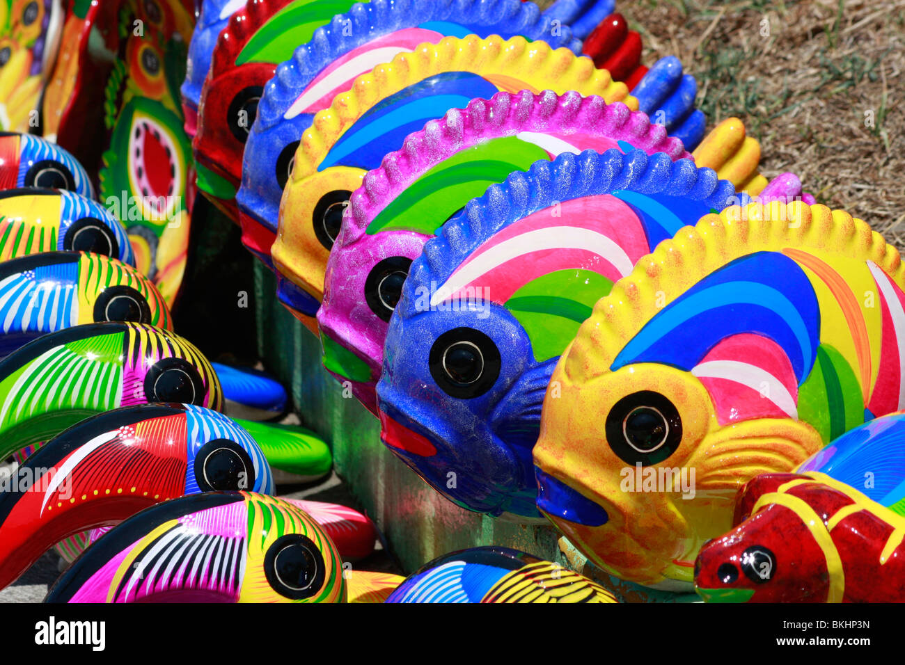 Acapulco brightly colored ceramic fish in a handicraft market Stock ...