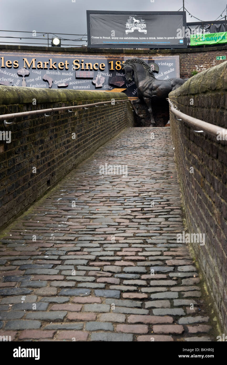 Brick and cobblestone passageway at the Horse Hospital Stables market ...