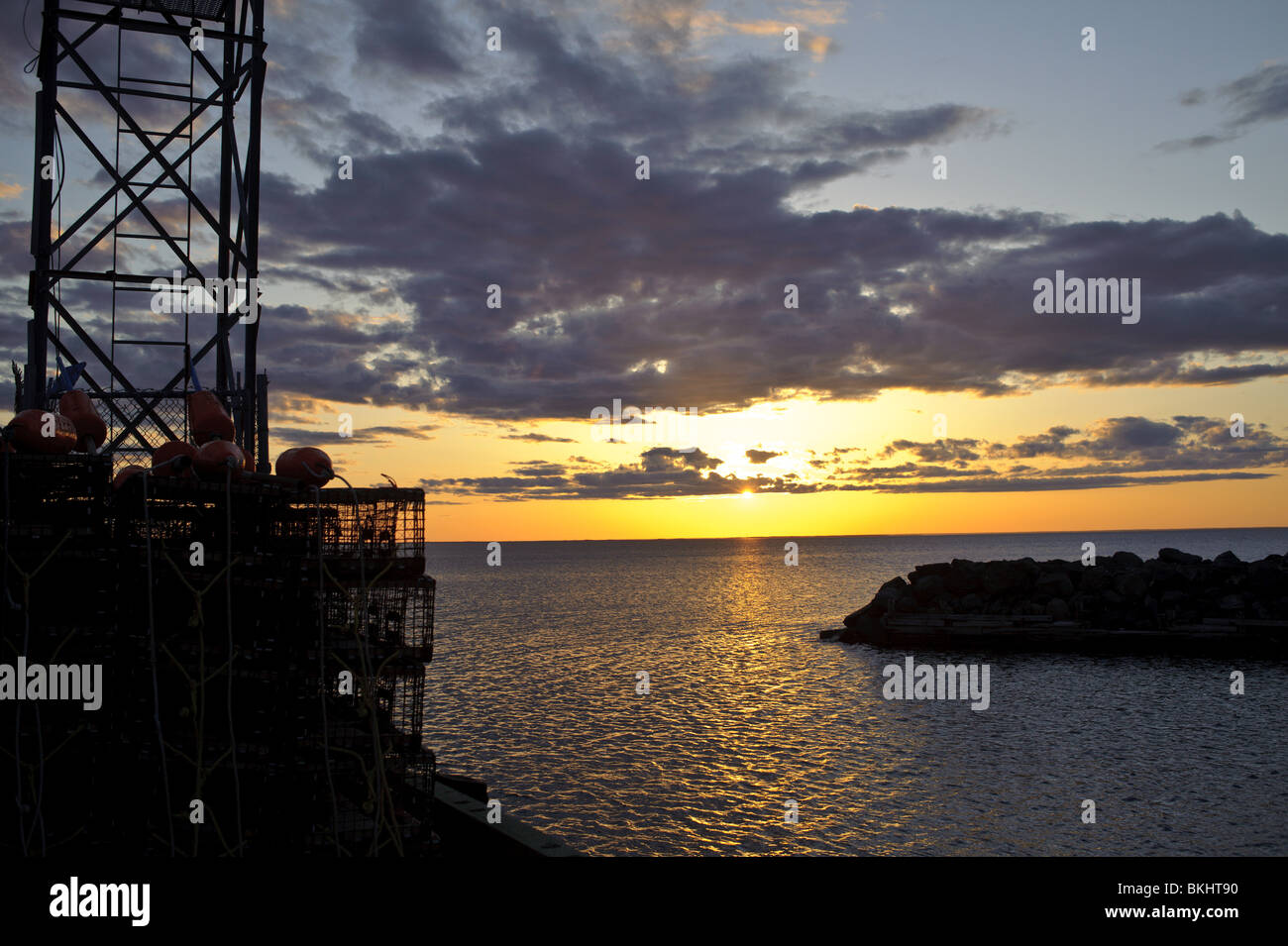 Escuminac Wharf of Miramichi Bay at Sunset with clouds new brunswick ...