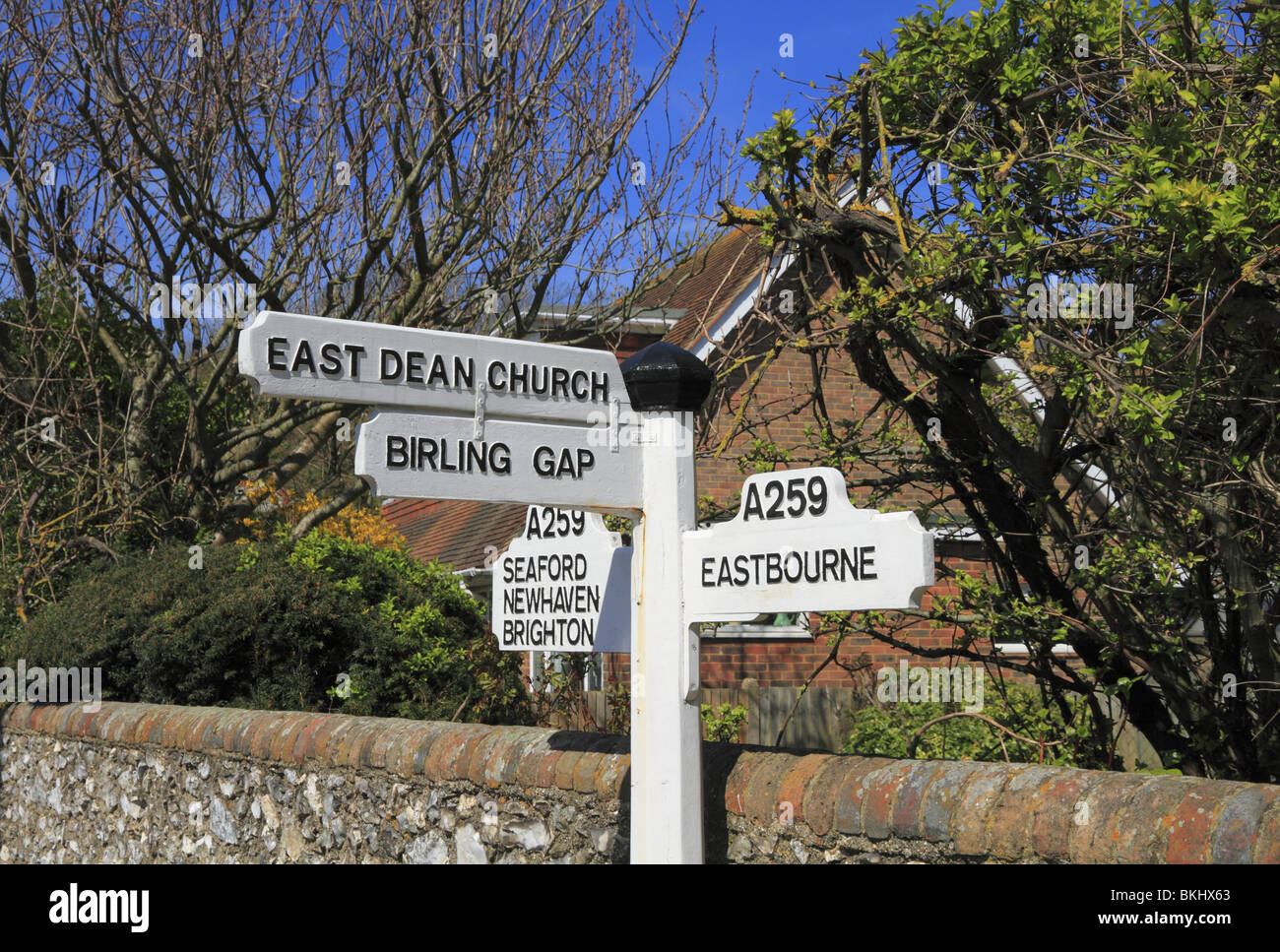 An old wooden signpost in the village of East Dean, near Eastbourne ...