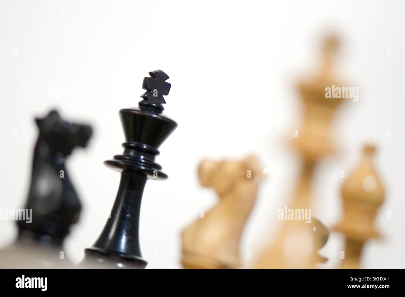 Chess. Black king resolute. Various chess pieces on chess board Stock ...