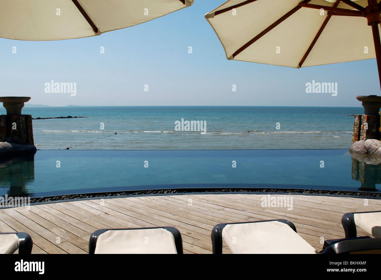 Infinity pool over look Pattaya beach, Thailand Stock Photo - Alamy