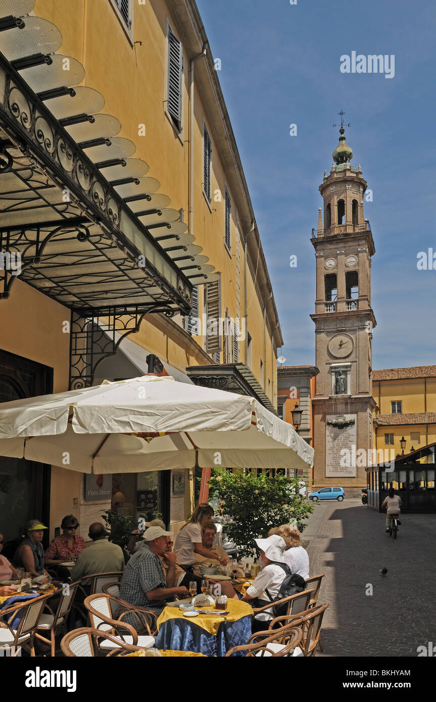 Al fresco café bar on Strada Cavour Parma Italy with people at tables ...