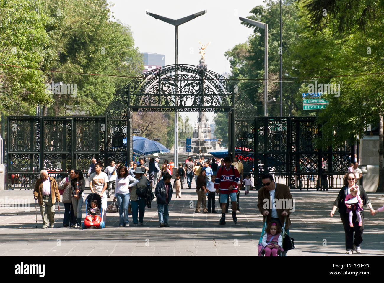 diverse multi ethnic crowd of people entering Chapultepec Park on a ...