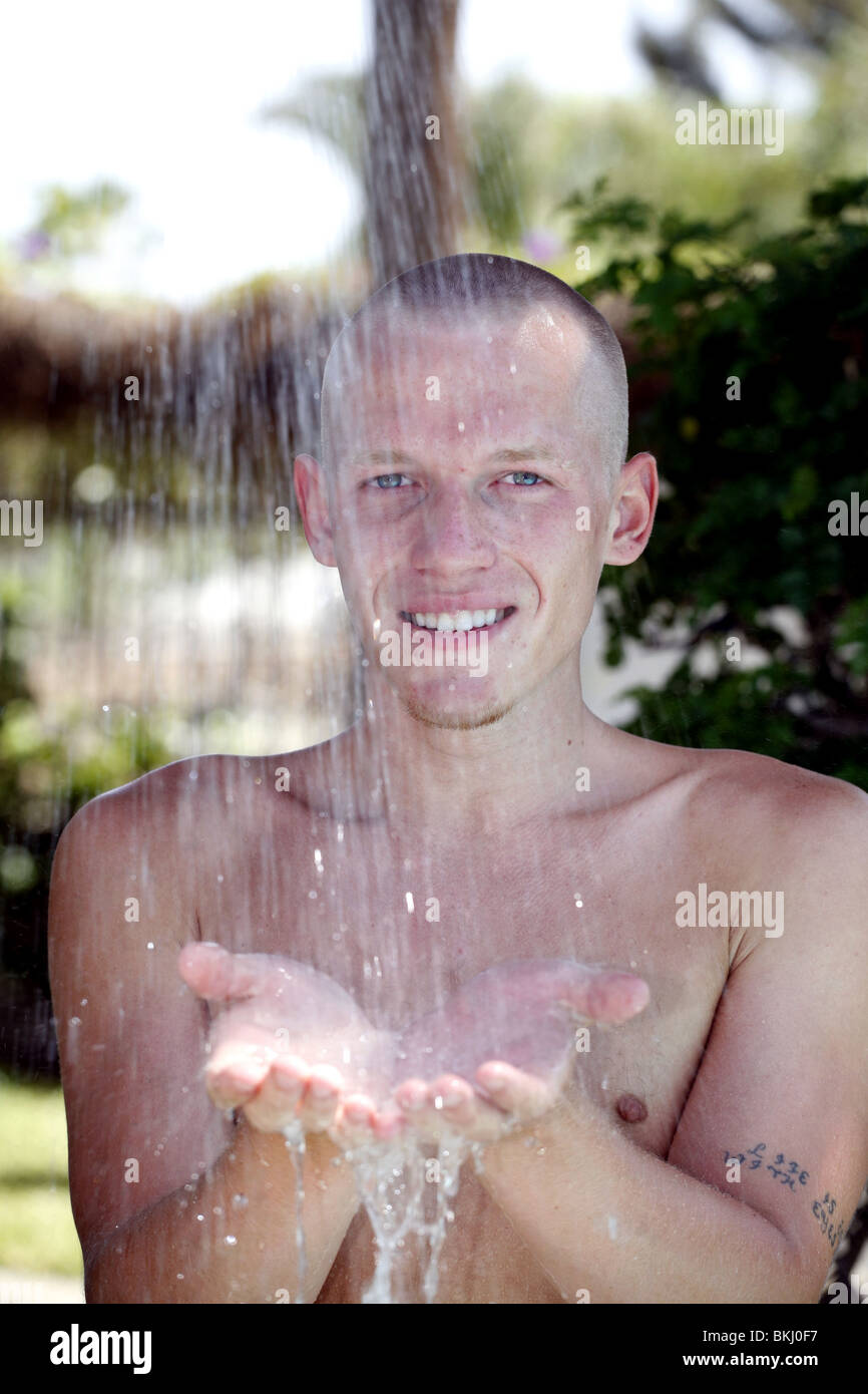Teenager showering hi-res stock photography and images - Alamy