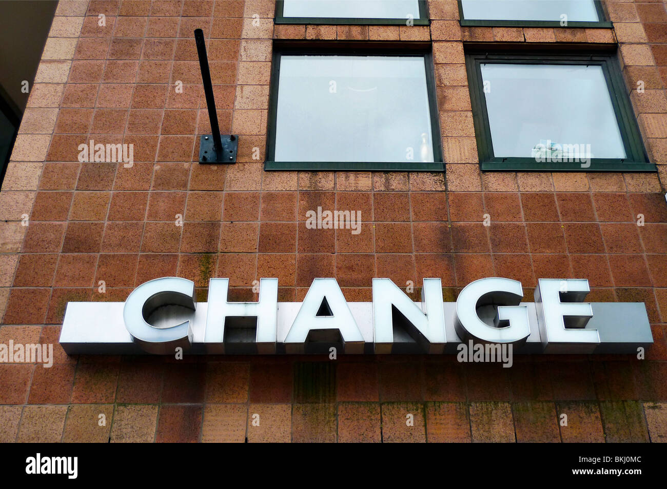 Change sign on building Stock Photo - Alamy