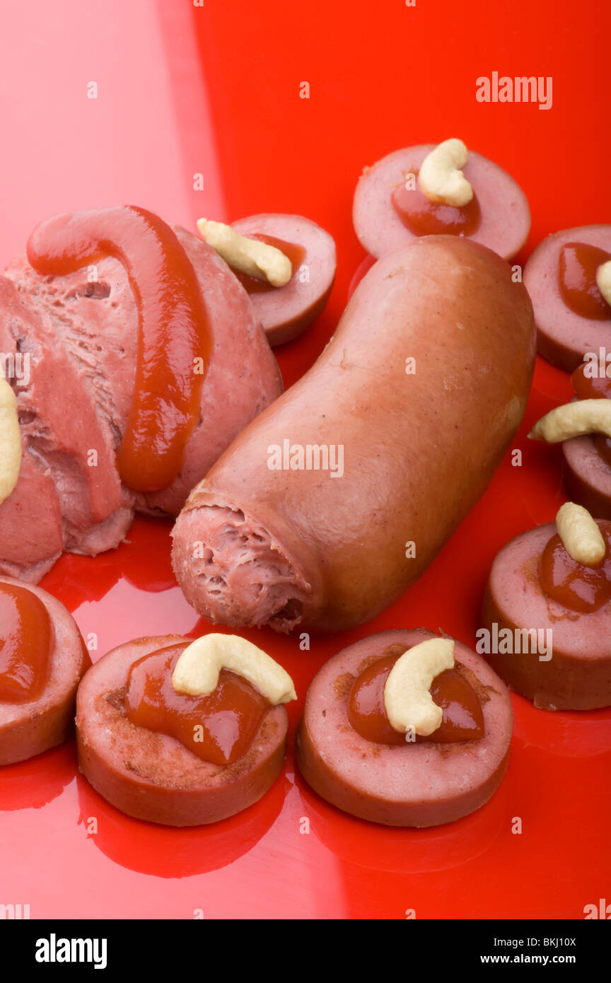 object on red - food sausage with ketchup and mustard Stock Photo - Alamy