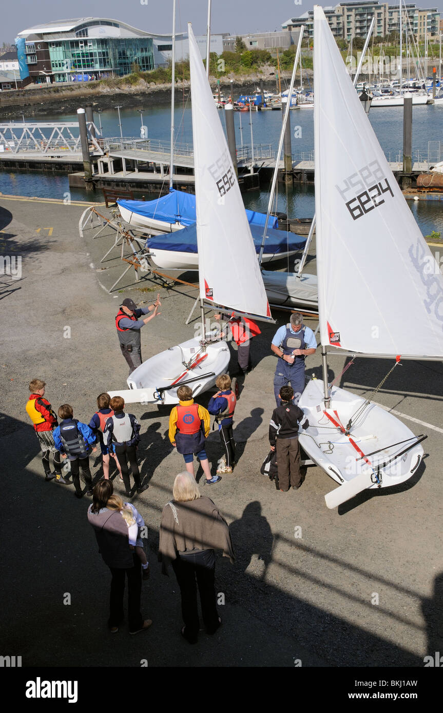 Children learning to sail on the harbourside in Plymouth south Devon ...